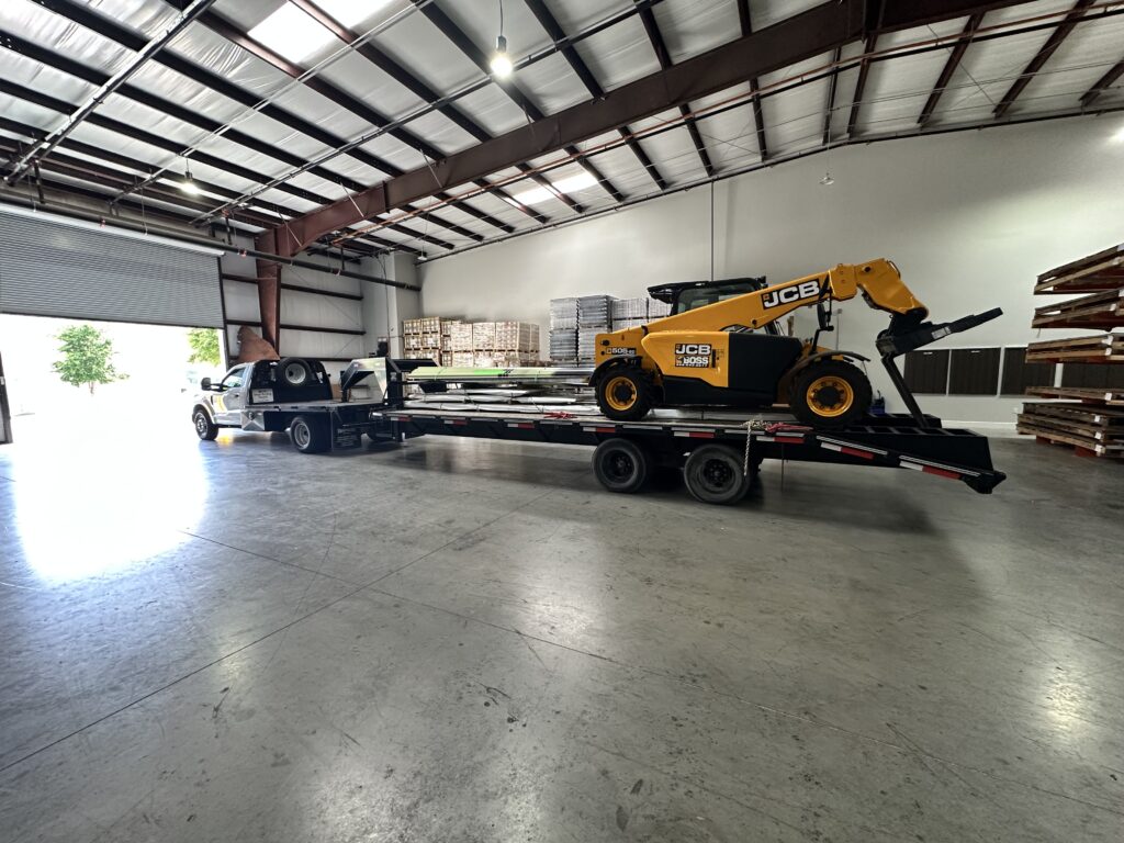 Loading the telehandler onto the flatbed – Janicek.com